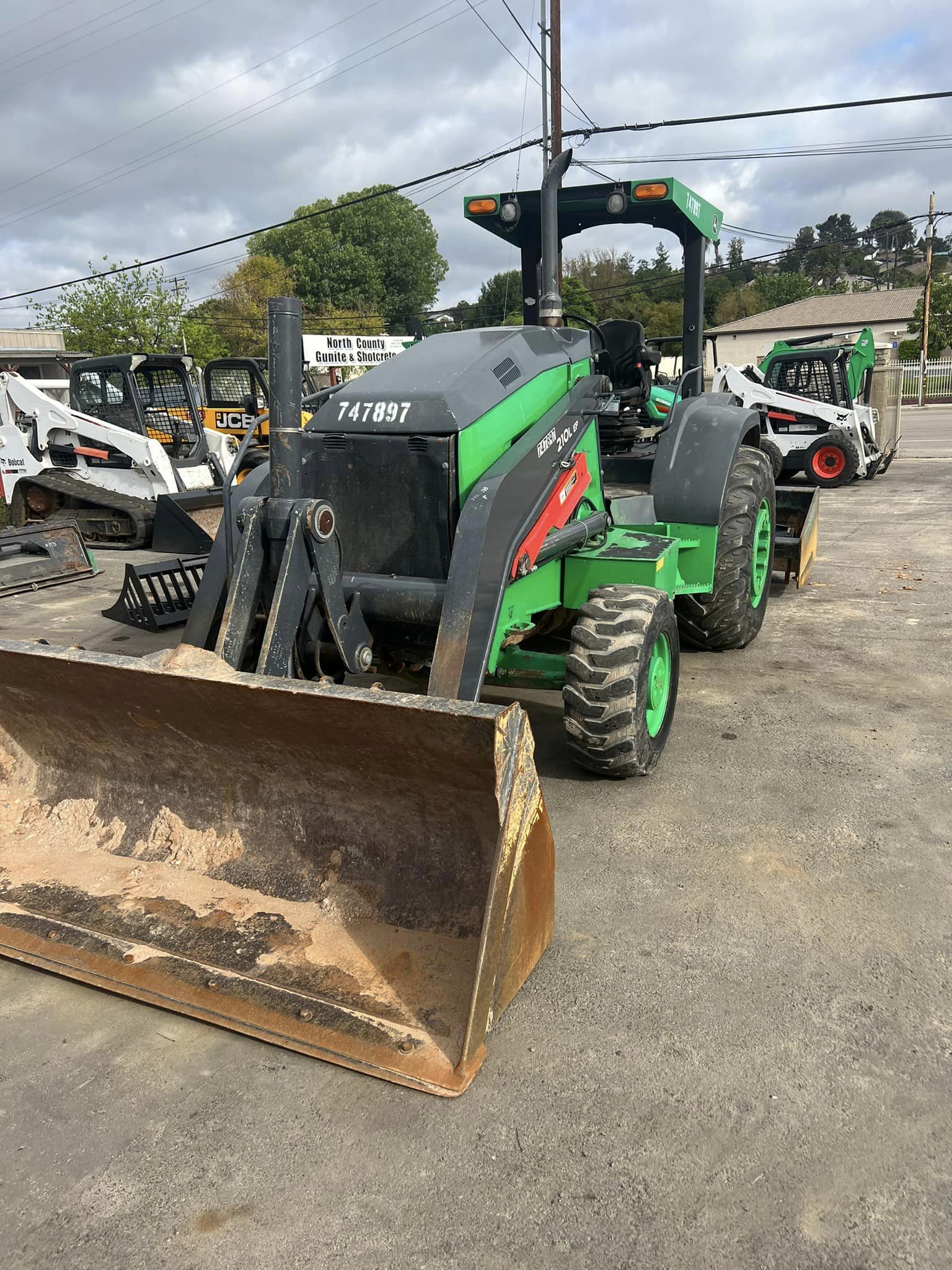 2015 John Deere 210 skip loader - Borneman Trucking, Inc.